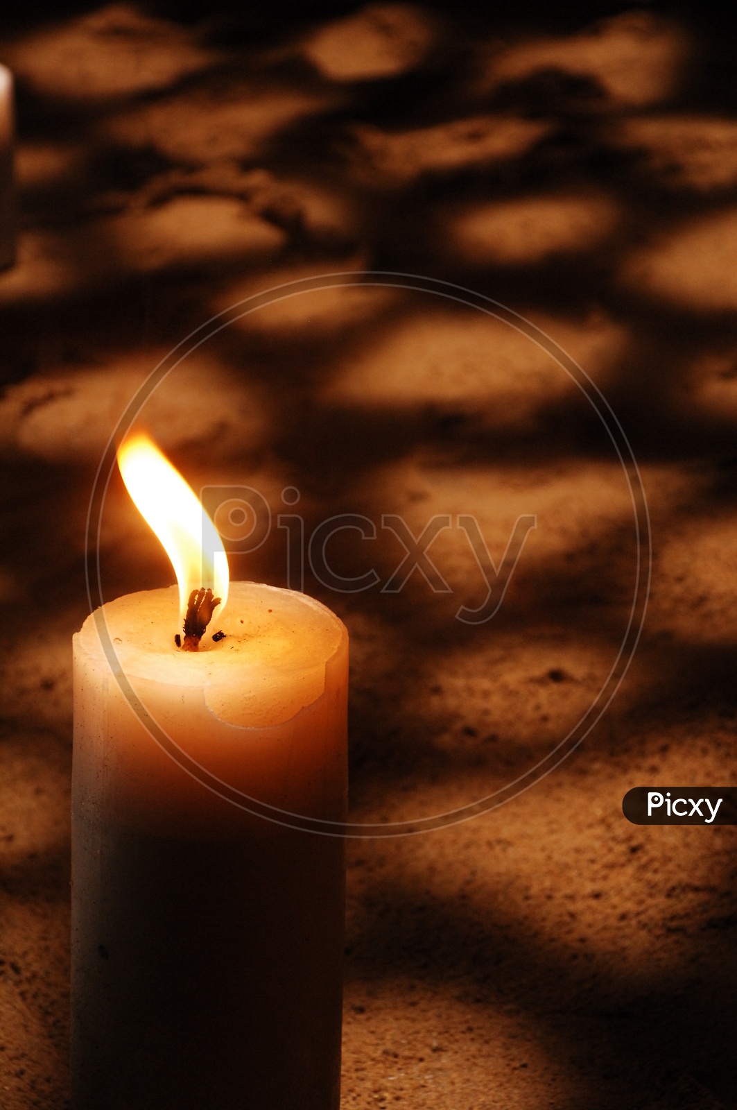 Image of A lit candle-NI227433-Picxy