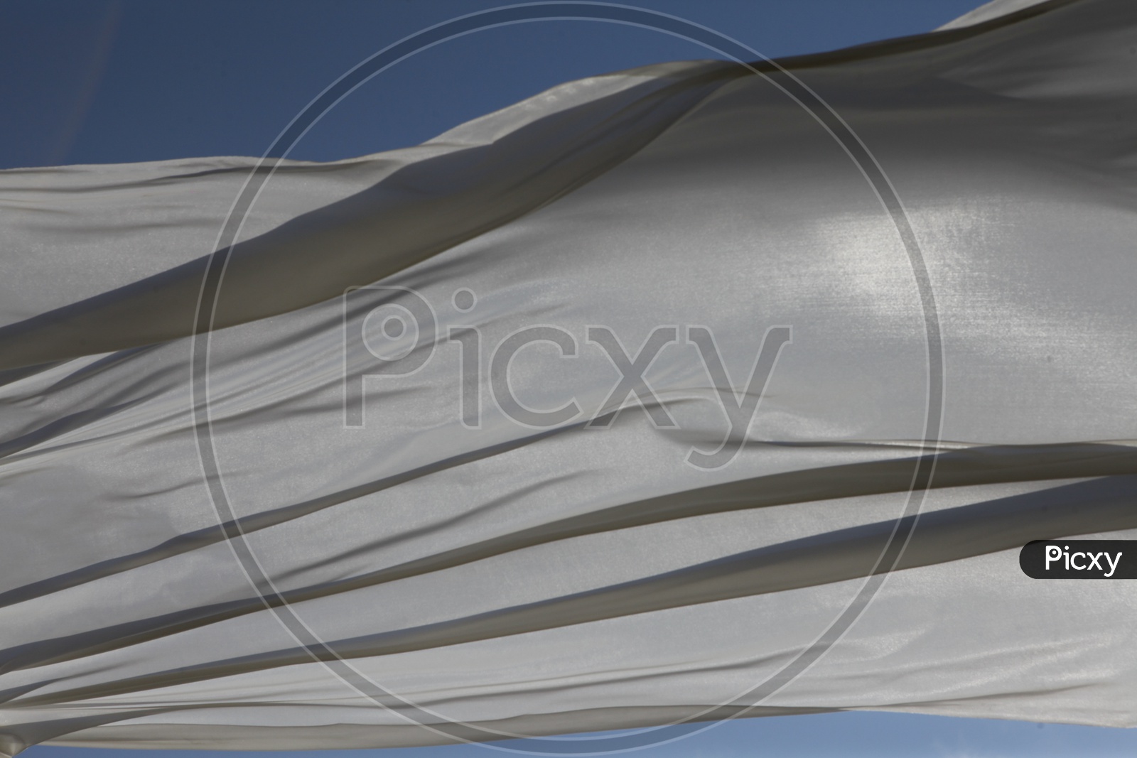 Image of White Silk Cloth Flying Or Waving In Air With Sky And Clouds ...