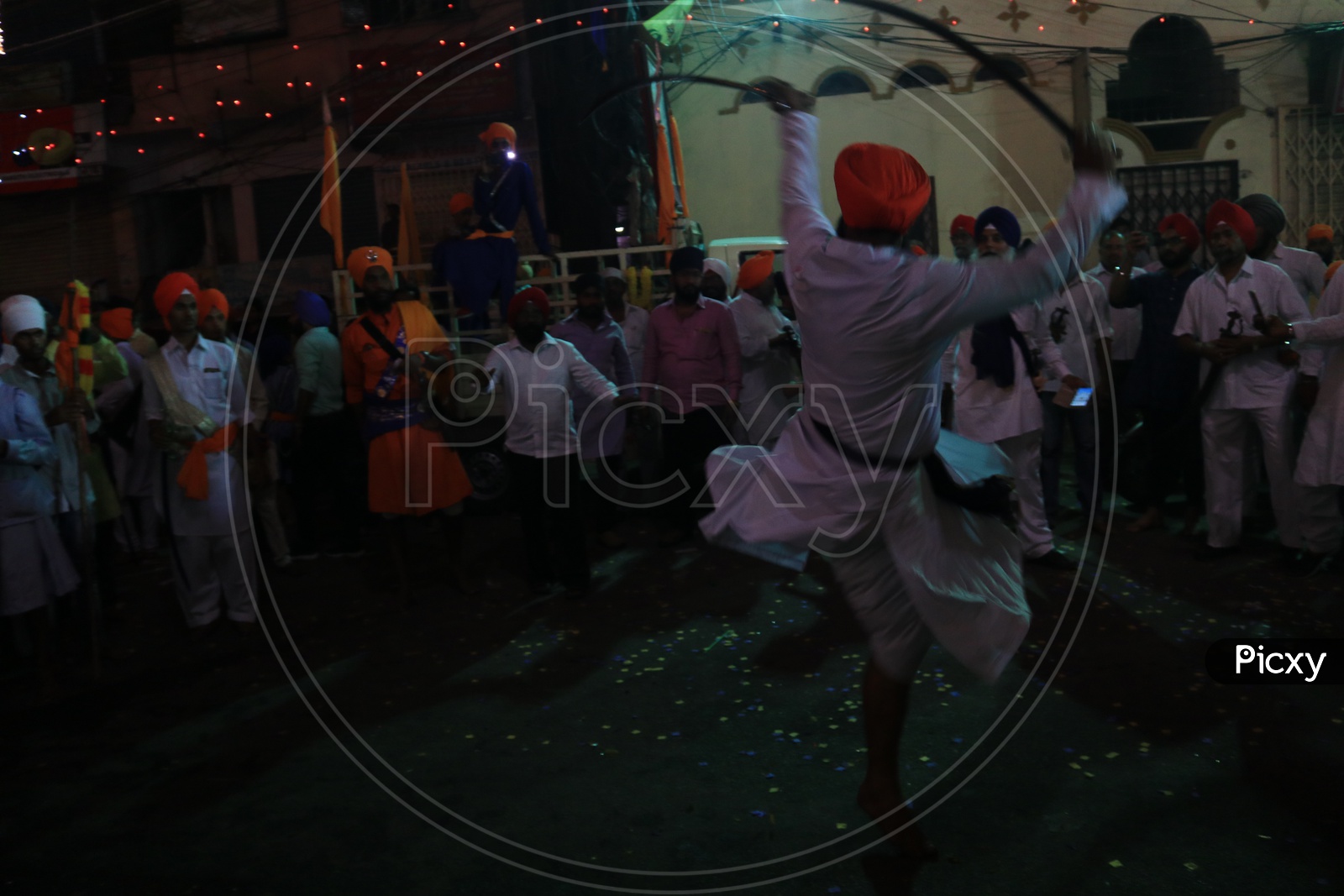 Image of Sikh People Dancing With Swords at Gurudwara-YW282410-Picxy
