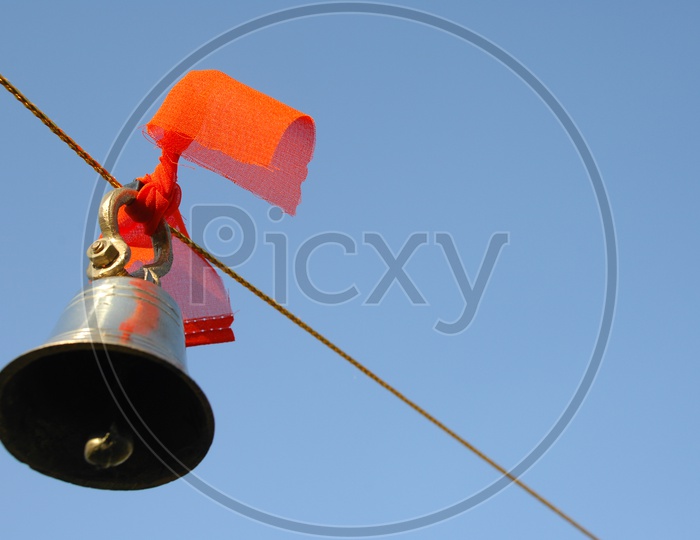 Image of Hanging bell tied to a rope-NG339401-Picxy