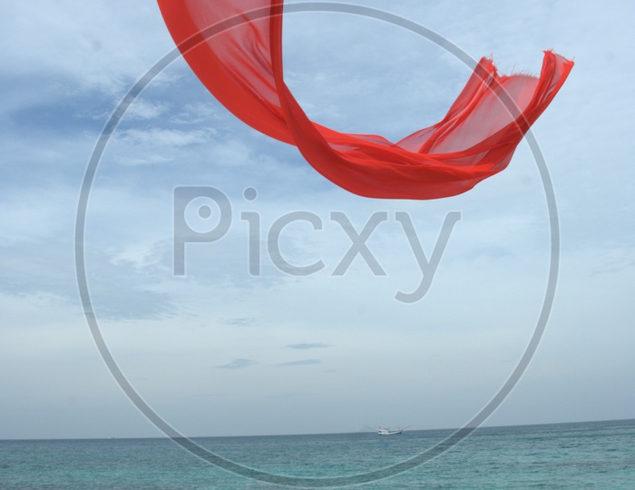 Image of White Silk Cloth Flying Or Waving In Air With Sky And Clouds ...