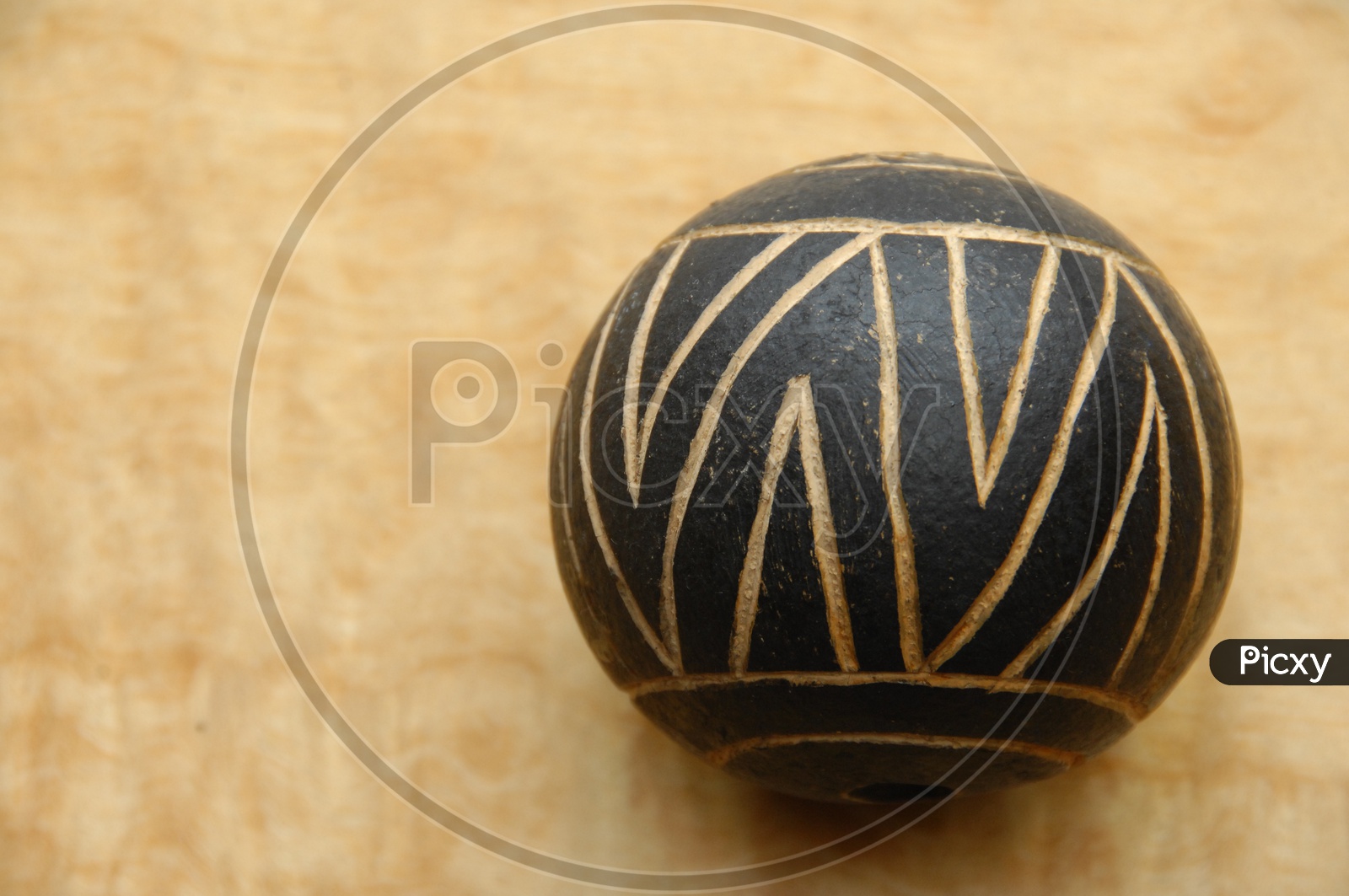Image of A black round ball with design-QZ596197-Picxy