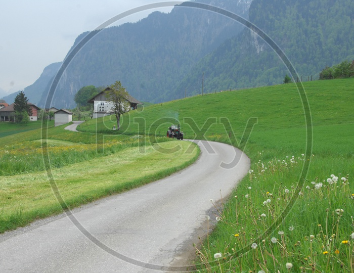 Image of A small road in between the fields-QD082003-Picxy