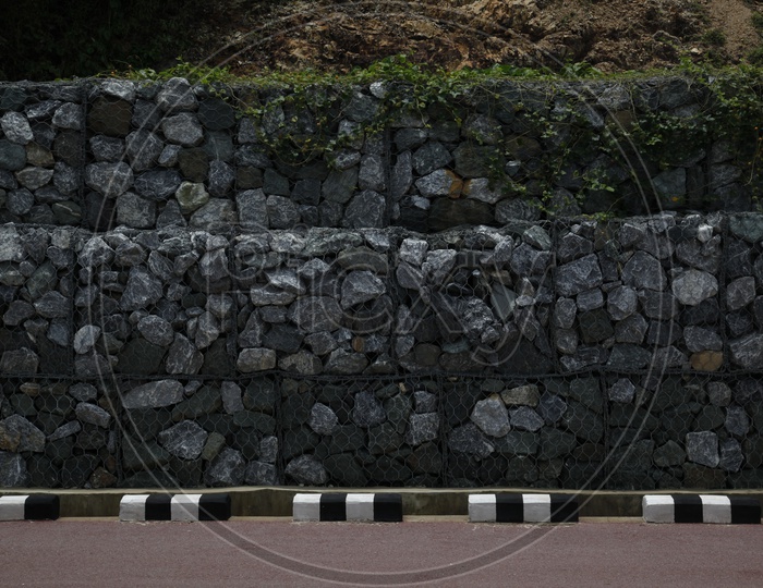 Image of View of rock wall alongside the road-FR173645-Picxy