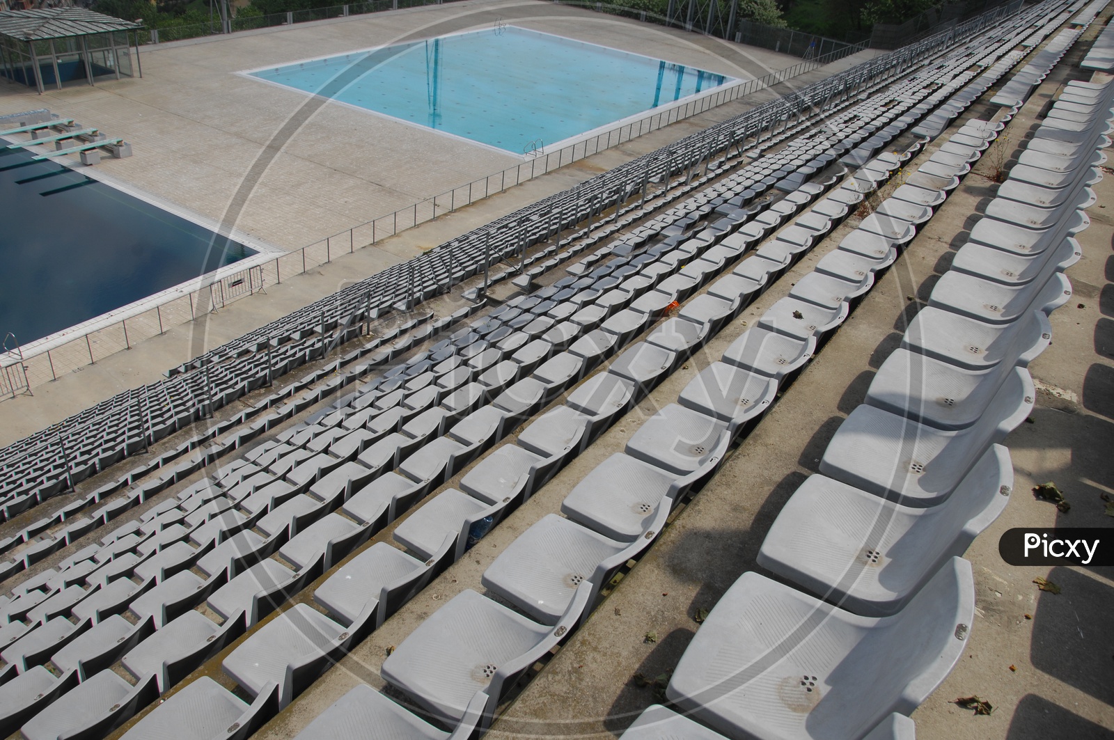 Image of Seating arrangement of audience by the swimming pool-IE983259 ...