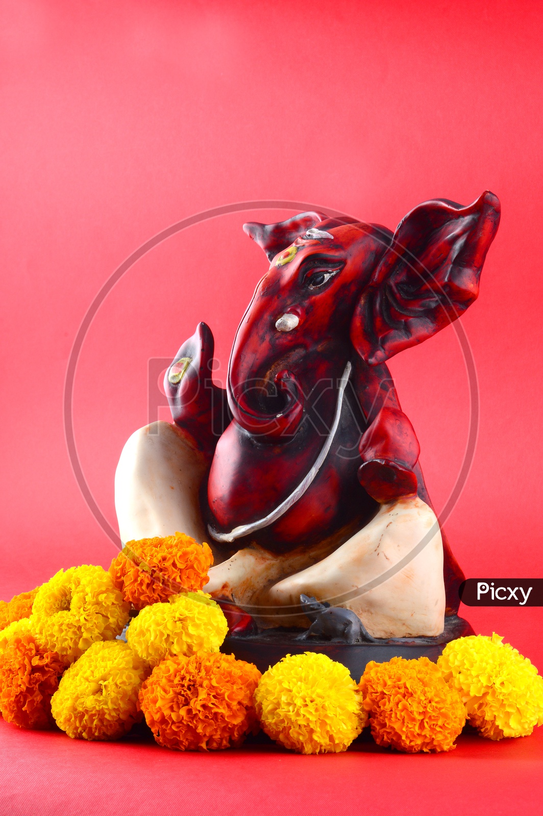 Image of Hindu God Ganesha or Ganapathi. Lord Ganesha Idol on Red ...