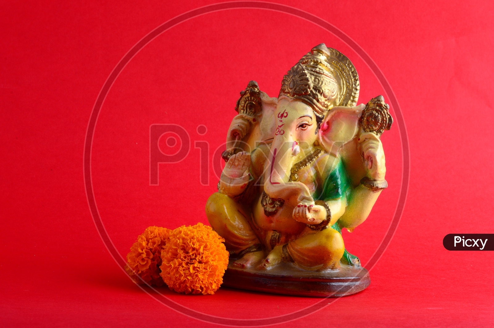 Image of Hindu God Ganesha or Ganapathi. Lord Ganesha Idol on Red ...