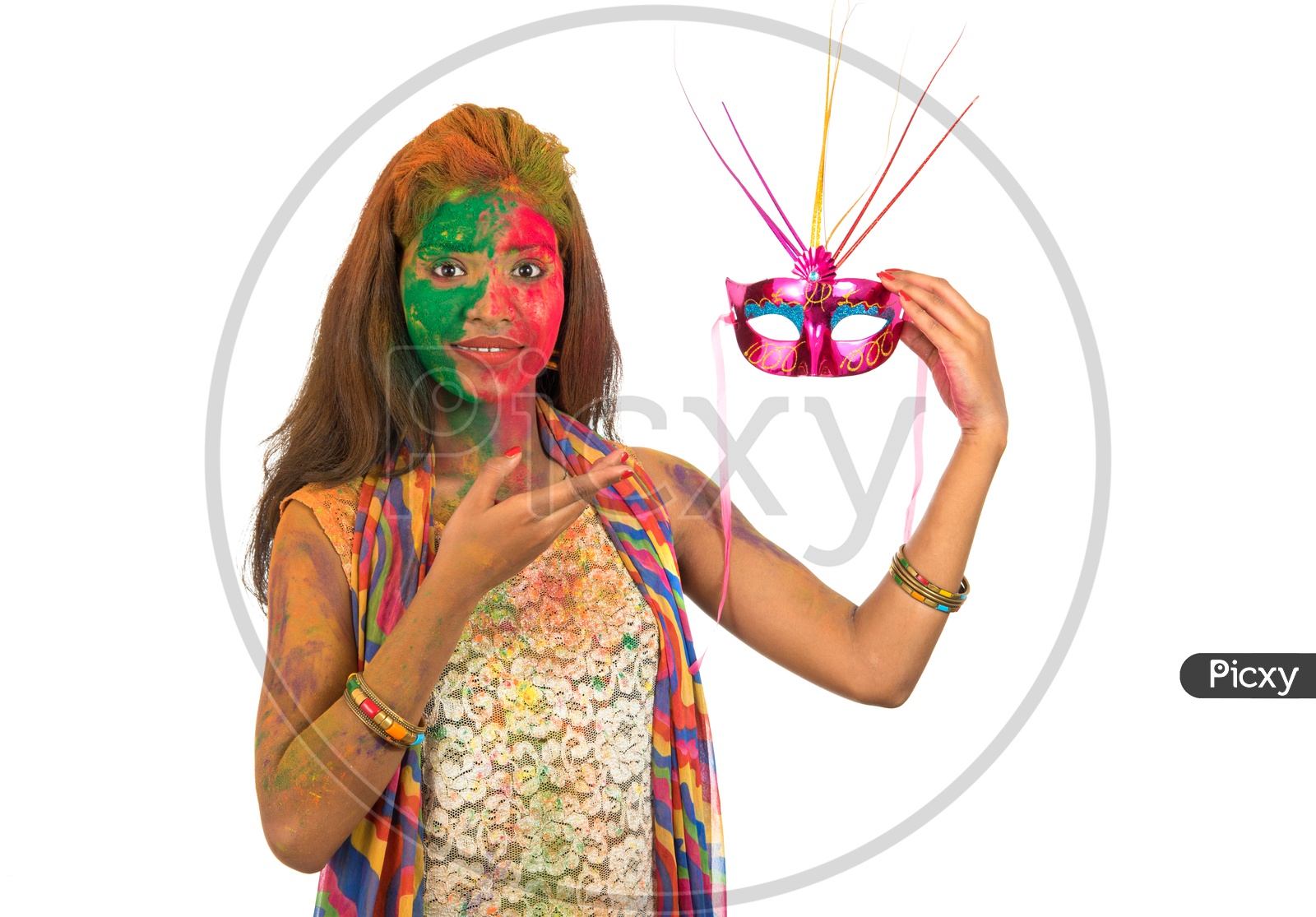 Image of Young girl Filled in Holi Colours holding Carnival Mask and ...