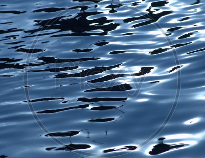 Image of Texture Of Water Ripples On a Water Surface-FY954646-Picxy