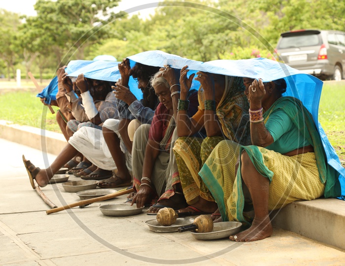 Image of Beggars Sitting On Road Side Platform-UB239494-Picxy