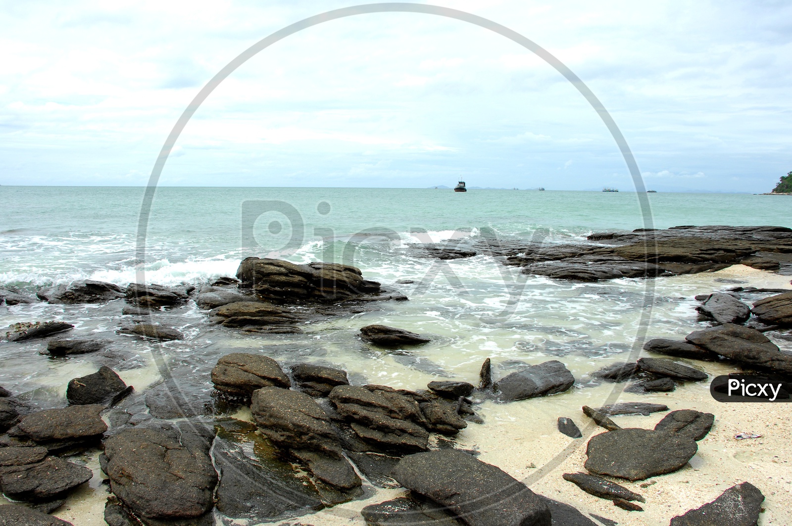 Image of Waves Touching The Rocks In a Beach-BW475960-Picxy