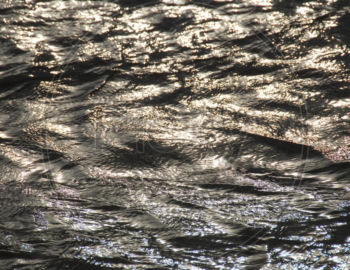 Image of Texture Of Water Ripples on a Water Surface-NR817616-Picxy