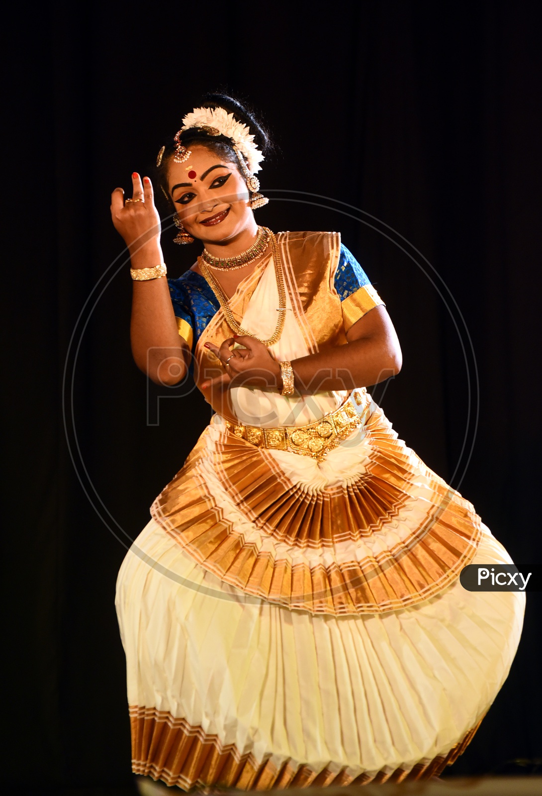 Image of Indian Classical dancer performing on stage-OT064078-Picxy