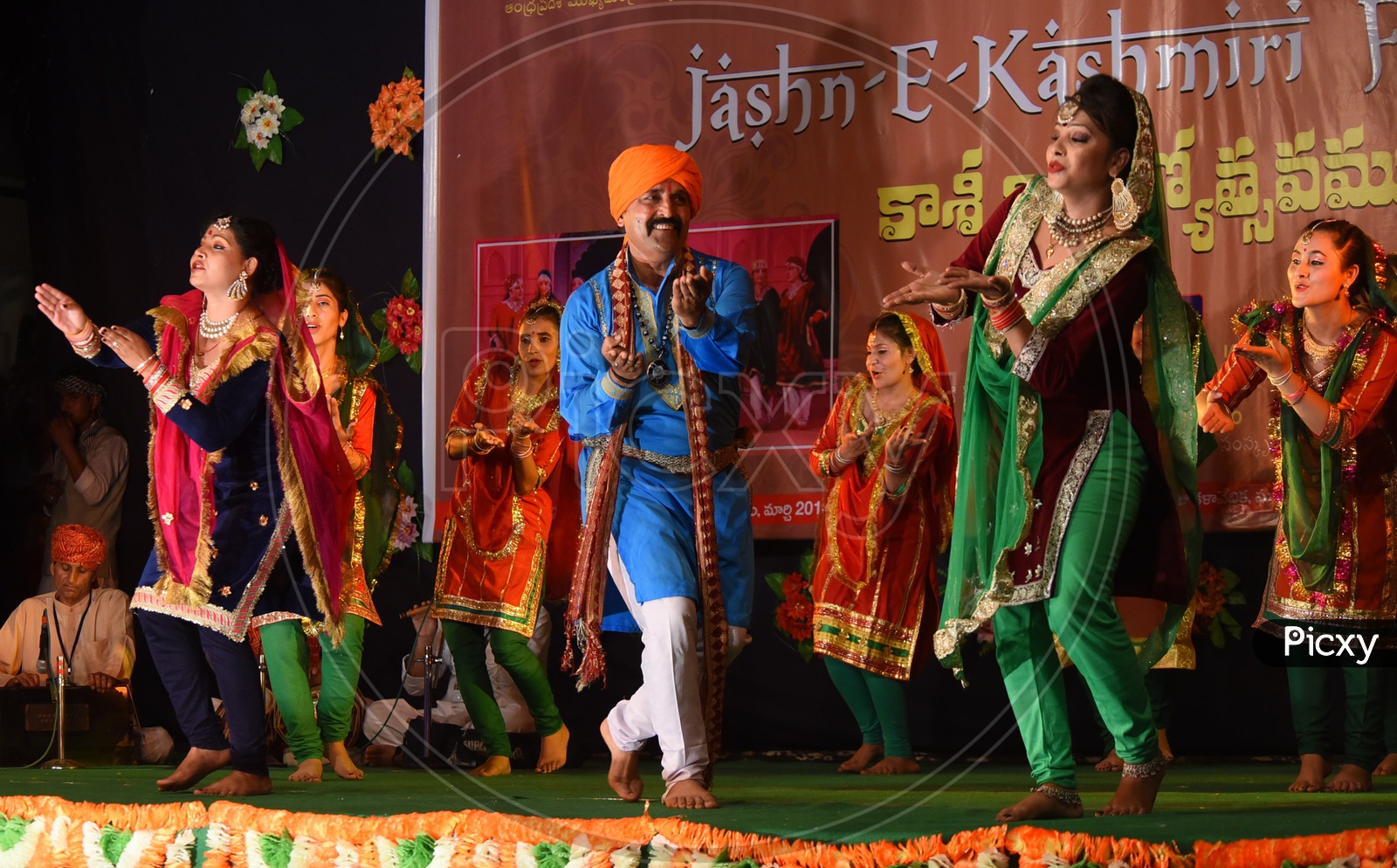 Image of Artists performing Bhand Jashan dance on stage-UI665842-Picxy