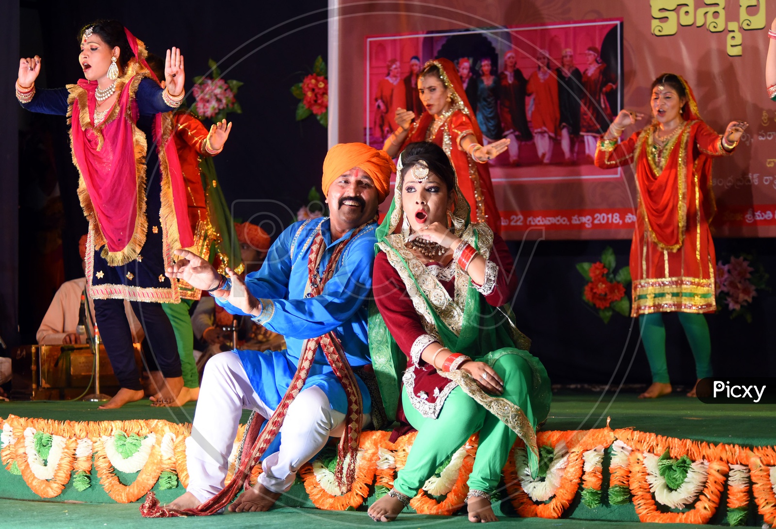 Image of Artists performing Bhand Jashan dance on stage-EA817887-Picxy