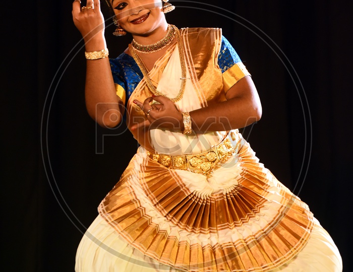 Image of Indian Classical dancer performing on stage-OT064078-Picxy