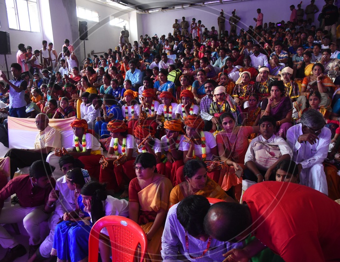 Image of School children and teachers in the auditorium watching the ...