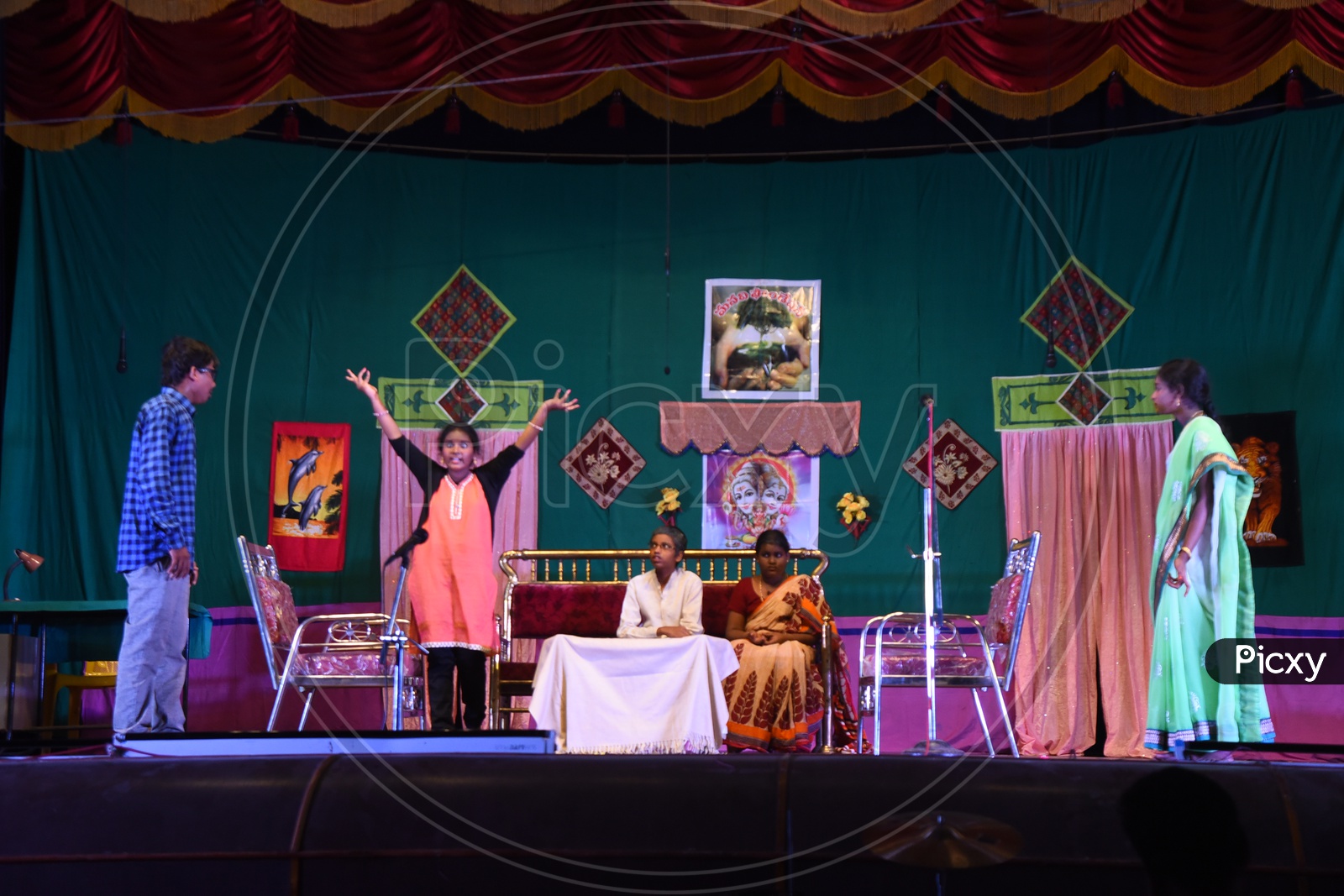 Image of Children enacting a play on the stage-JU852329-Picxy