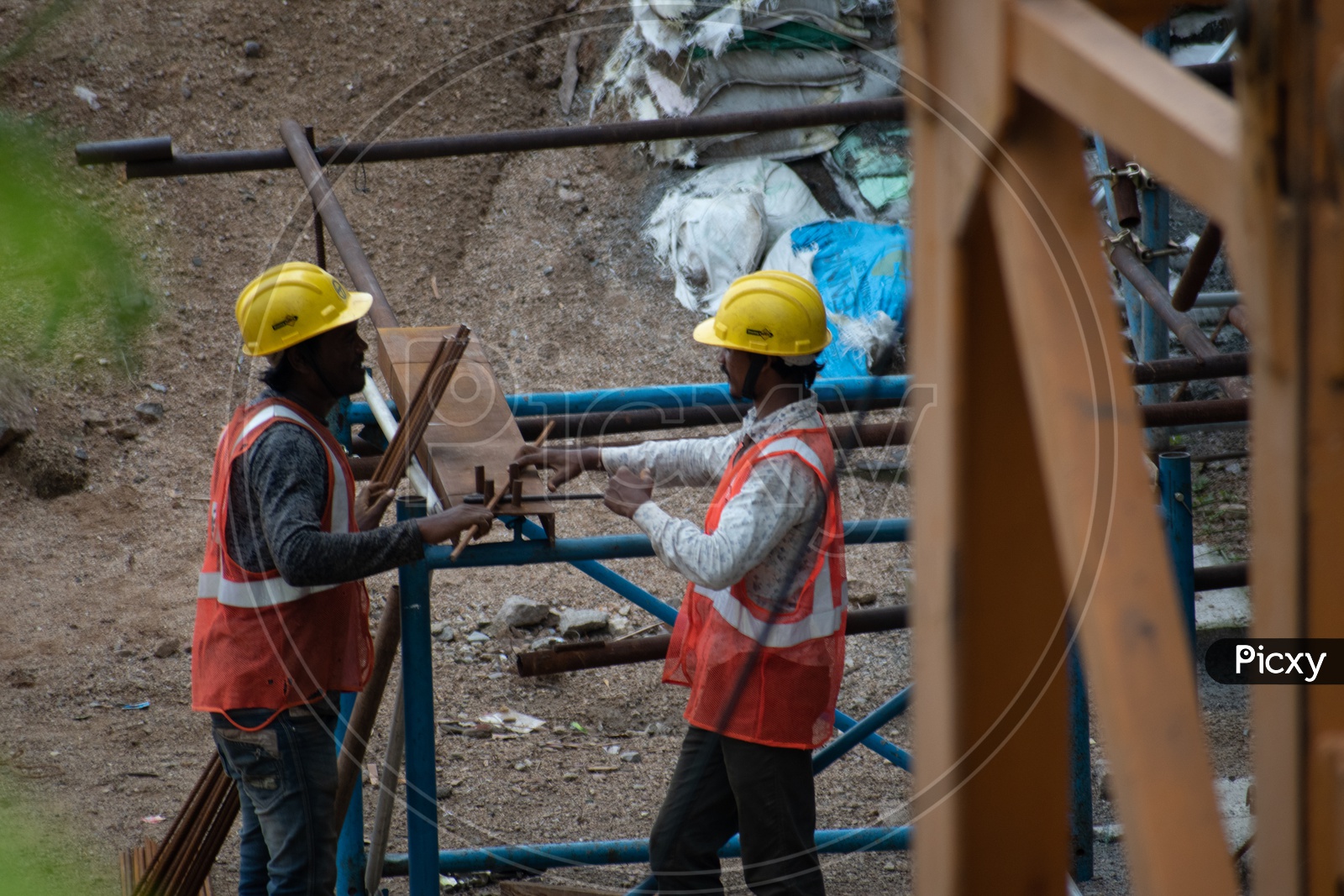 Image of L&T CONSTRUCTION COMPANY WORKERS BUILDING SUSPENSION BRIDGE ...