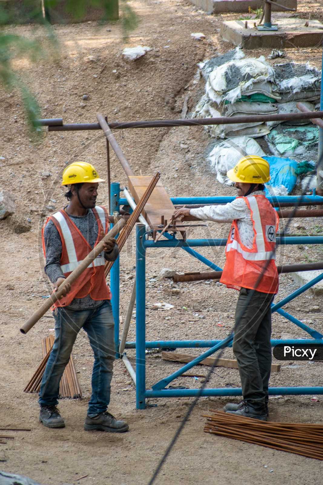 Image of L&T CONSTRUCTION COMPANY WORKERS BUILDING SUSPENSION BRIDGE ...