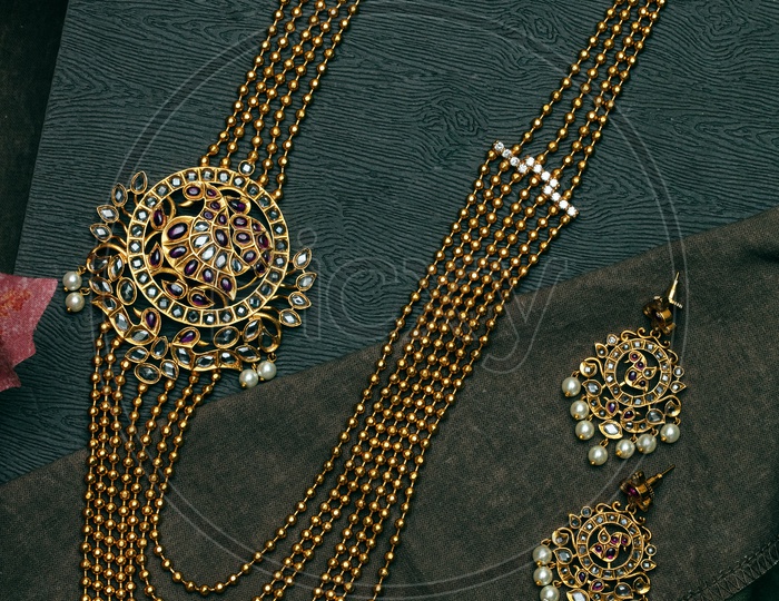 Image of Traditional Chandraharam with earrings and pearls attached ...