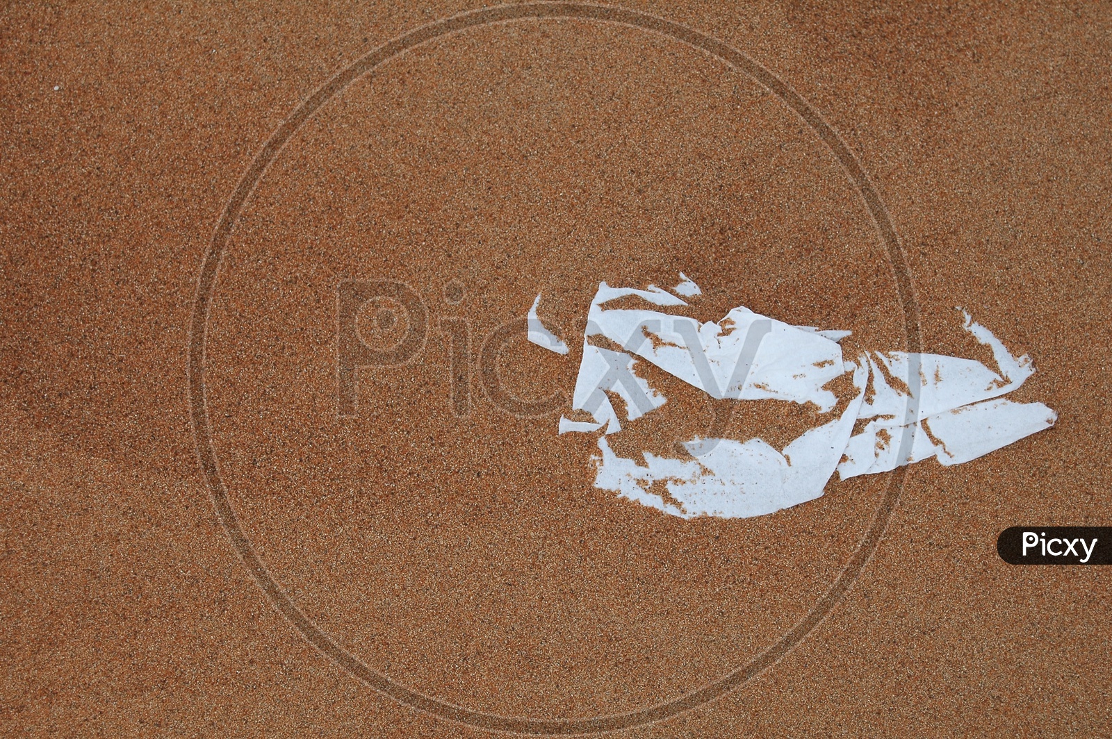 Image of Paper buried in the Sand-IH568230-Picxy