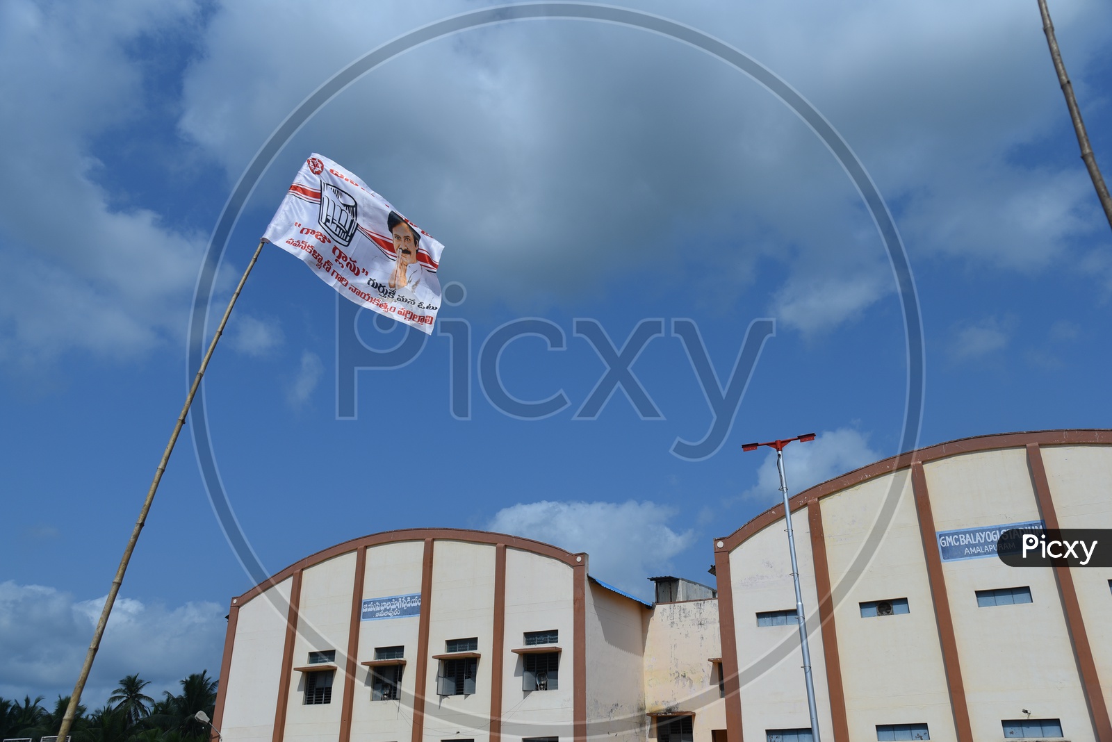 Image of Jana Sena party symbol "Glass tumbler" on a flag-TR081167-Picxy