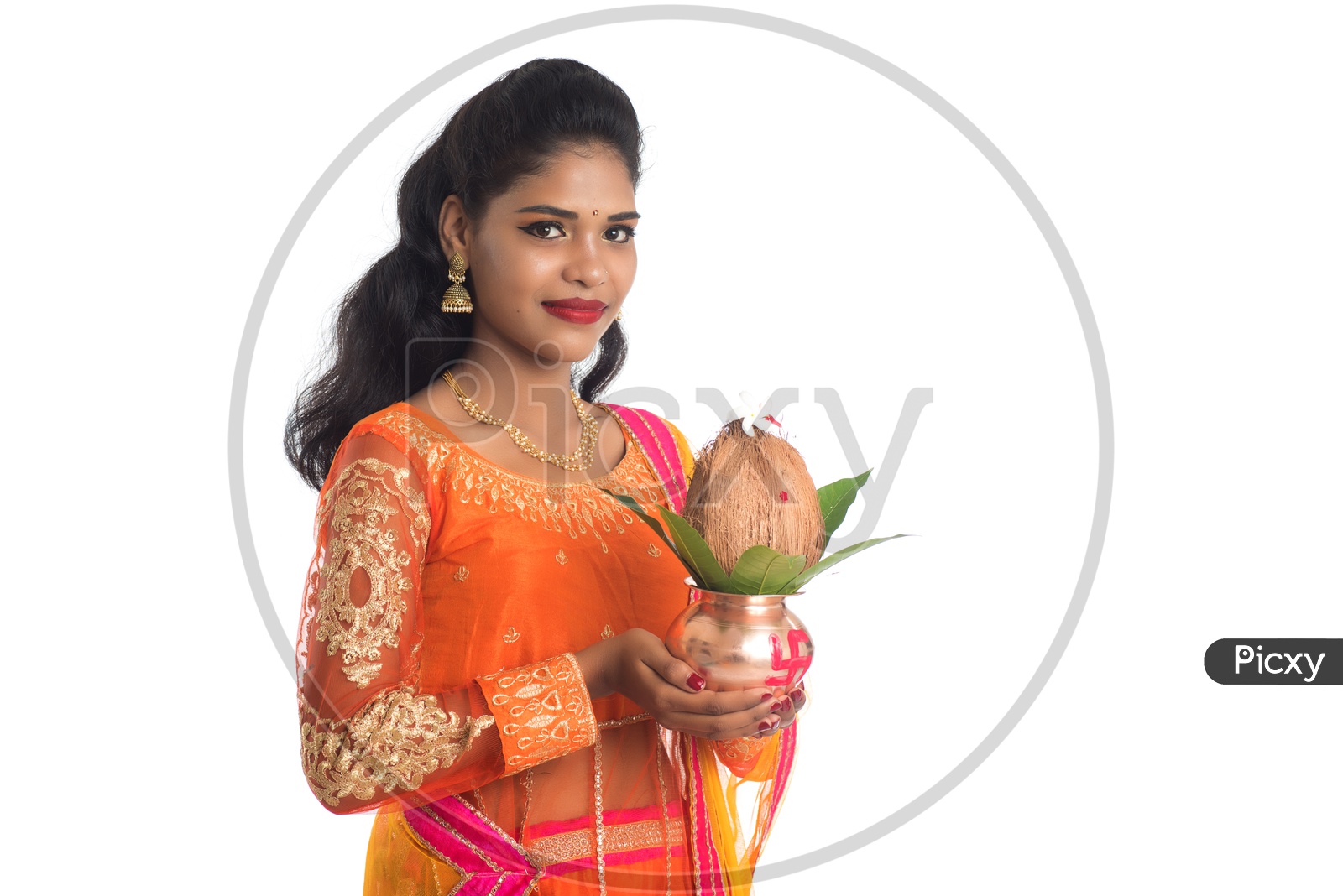 Image of A Young Traditional Indian Woman Holding Copper Kalash In Hand ...