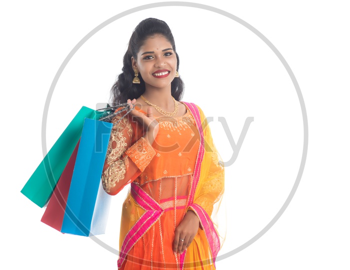 Image of Young Indian Traditional Girl Holding Shopping Bags Or ...