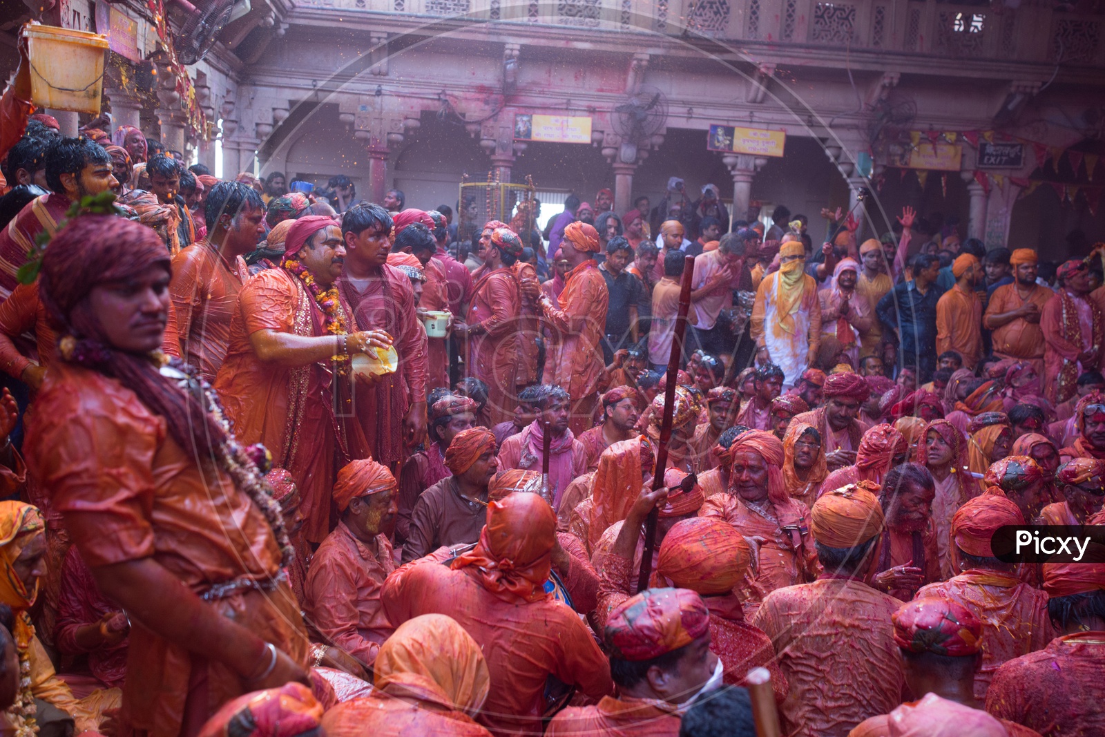 Image of Local People In Barsana Celebrating Lathmar Holi as a Crowd ...