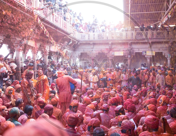 Image of Local People In Barsana Celebrating Lathmar Holi as a Crowd ...