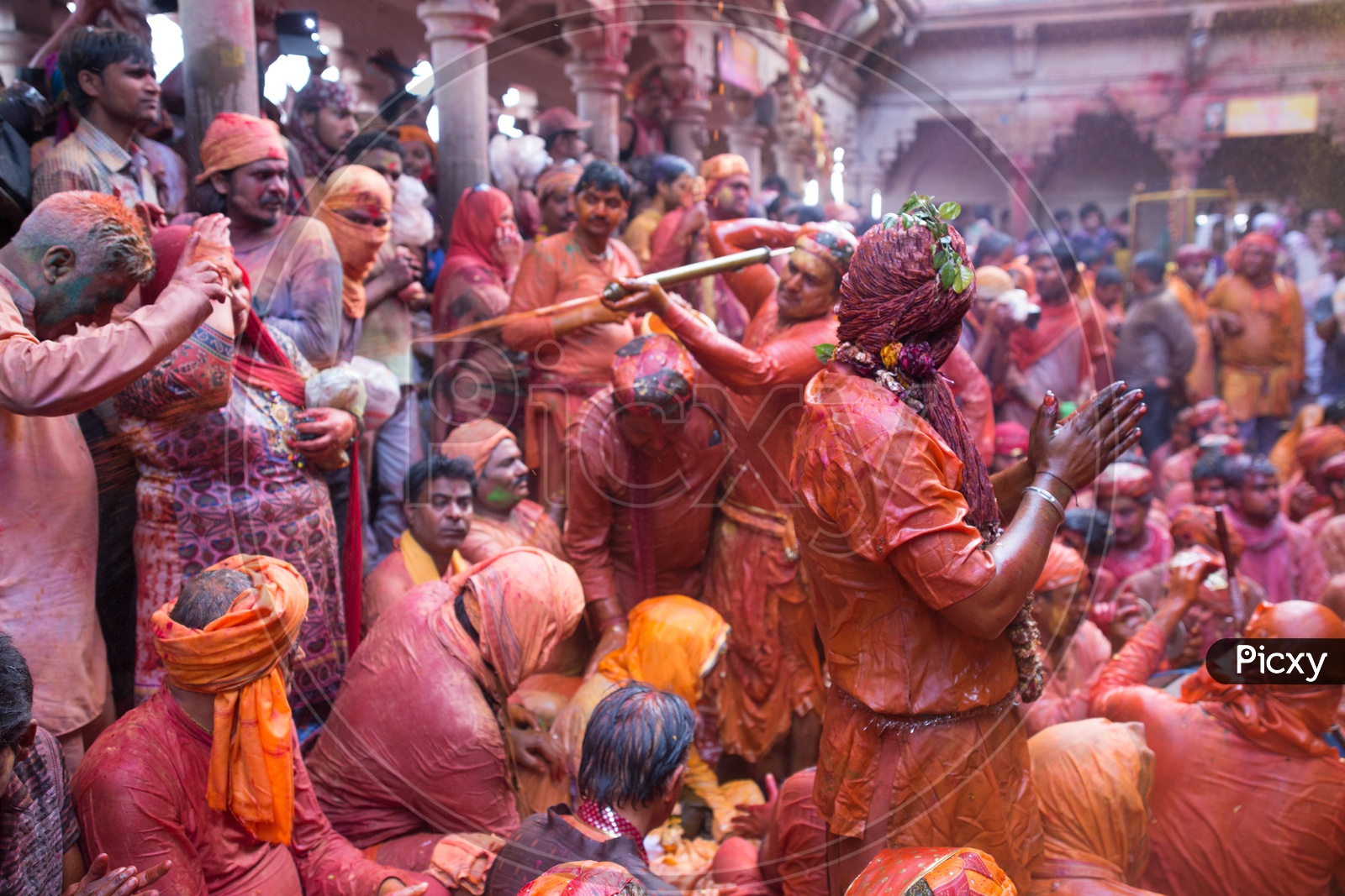 Image of Local People In Barsana Celebrating Lathmar Holi as a Crowd ...