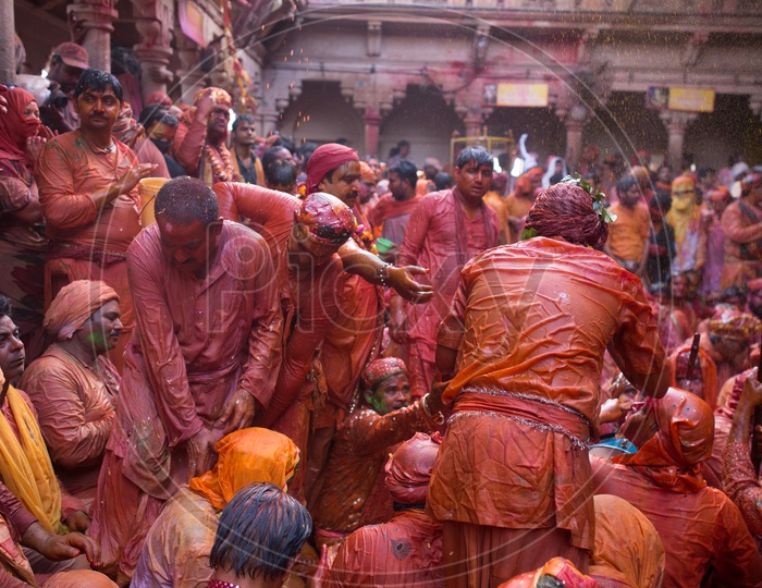 Image of Local People In Barsana Celebrating Lathmar Holi as a Crowd ...