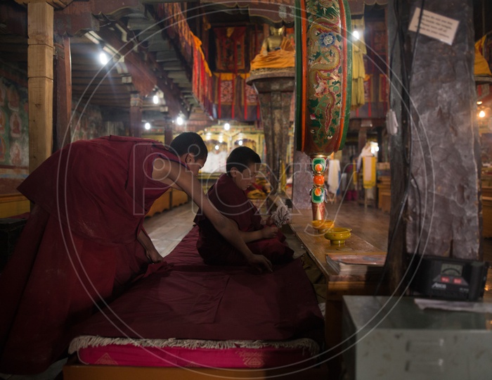 Image of Young Monks having sacred food in the monastery-QU287161-Picxy