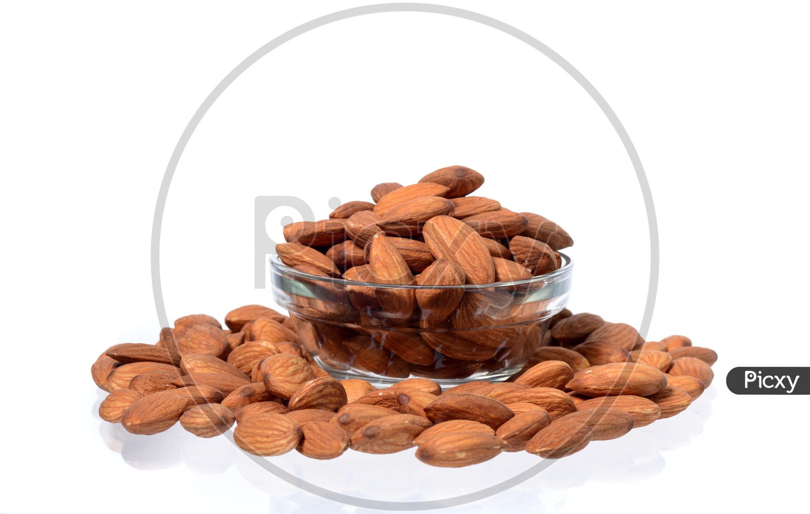 Image of Almonds Or Badam Nuts Heap In a Glass Bowl On an Isolated ...