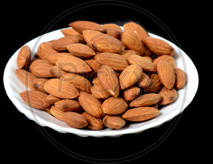 Image of Almonds/ Badam pappu on a white background.-LF153277-Picxy