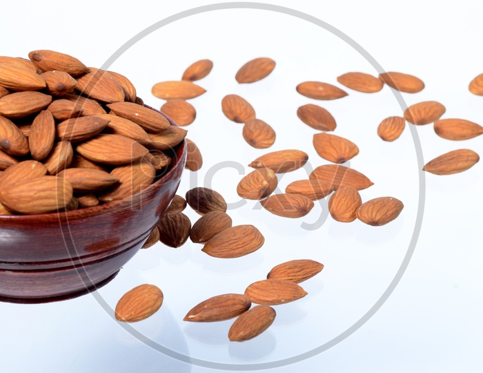 Image of Roasted Almonds Or Badam Nuts In a Bowl On an Isolated White ...