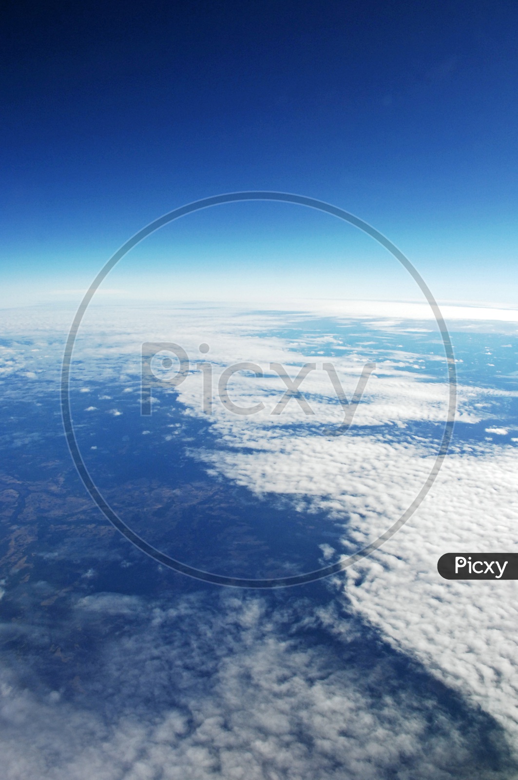 Image of Aerial view of clouds in the sky-FM975139-Picxy