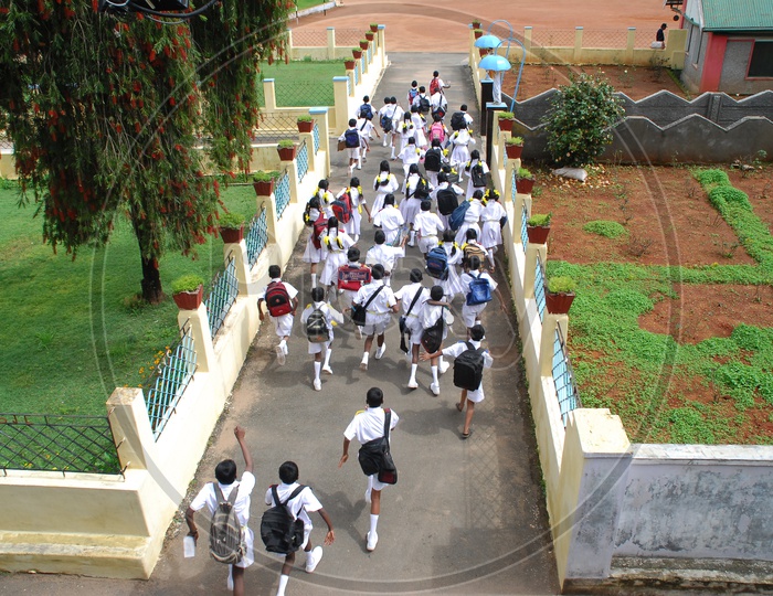 Image of School kids getting out from the school-UY556474-Picxy