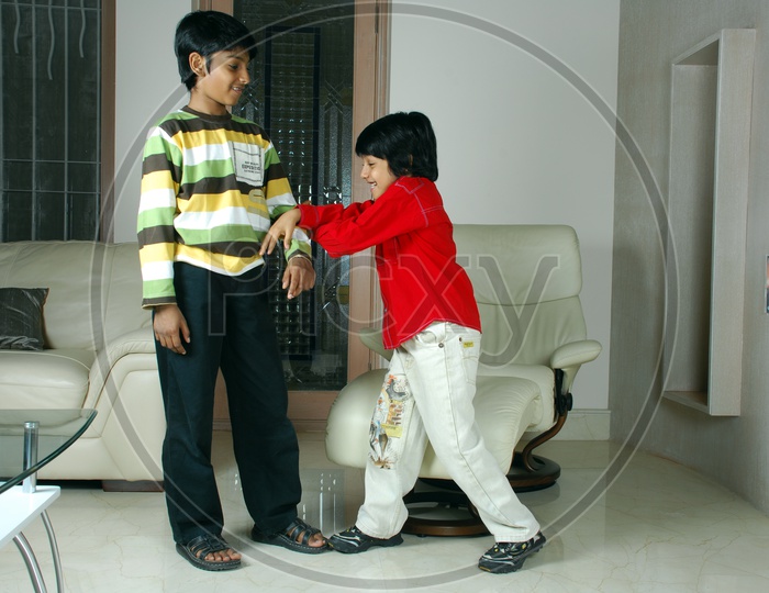 Image of Two Indian boys fighting playfully-XD664133-Picxy