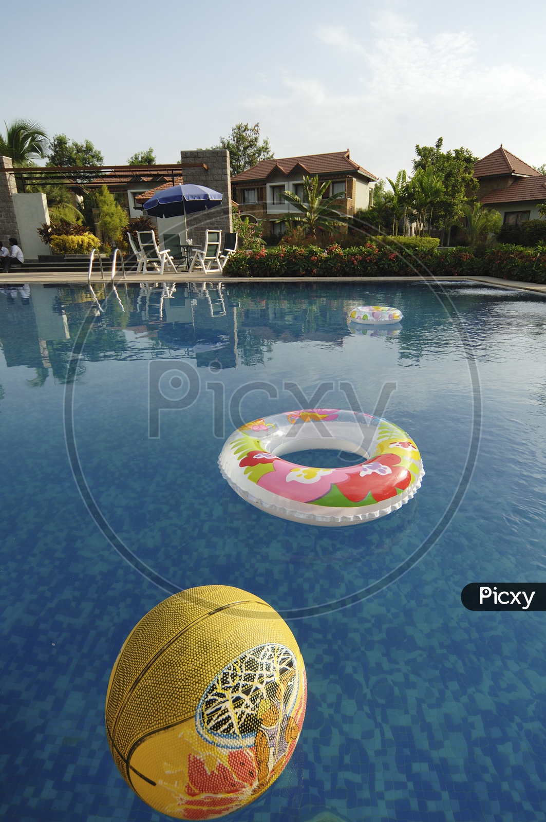 Image of Swimming pool along the resort-UZ343953-Picxy