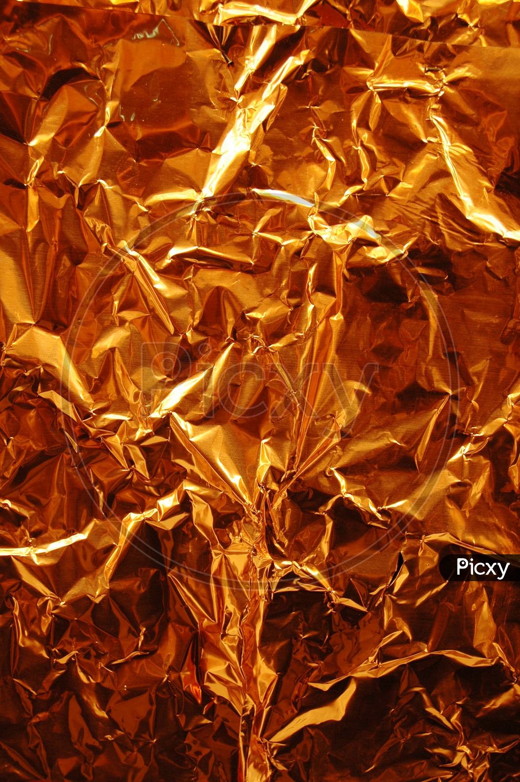 Image of Abstract of a crushed gold foil-MV542255-Picxy