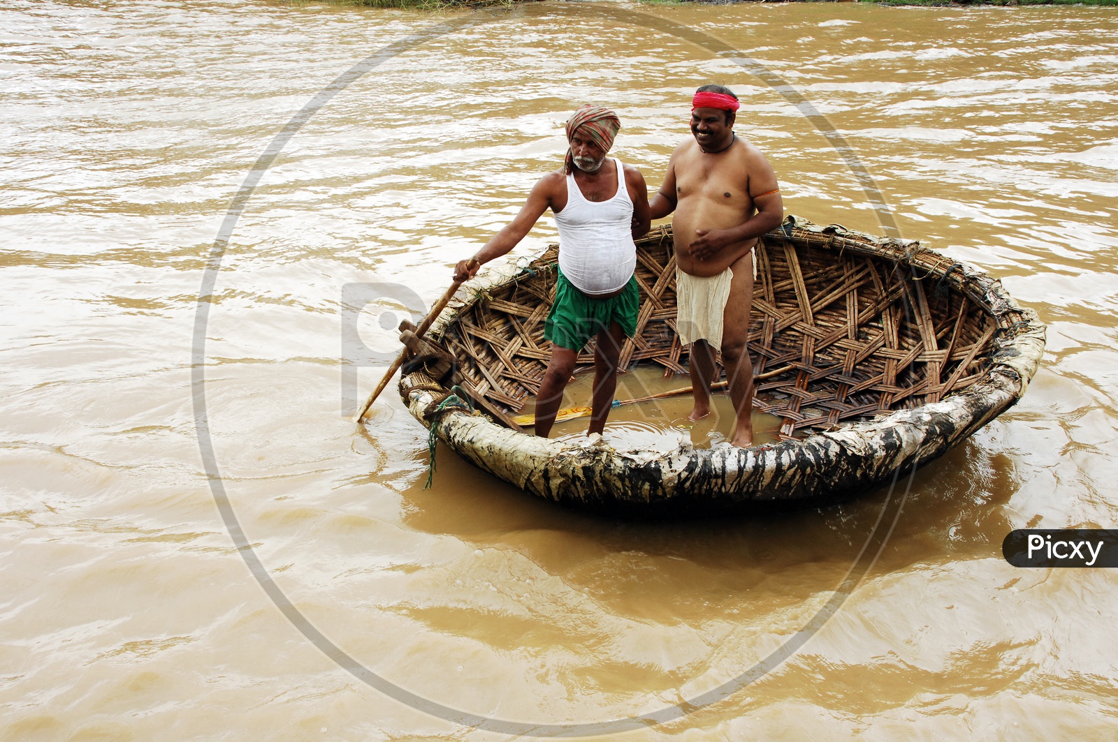 Image of Indian People Sailing on Coracle-DF143444-Picxy