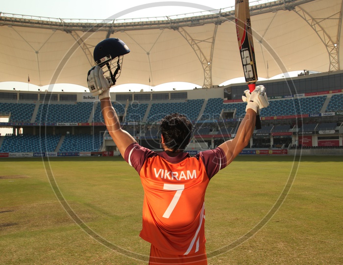 Image of Gestures of a Cricket Batsman After Scoring Century-IO082872-Picxy