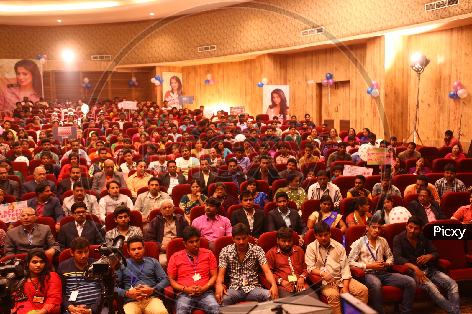 Image of Crowd Sitting In An Auditorium-AM024613-Picxy