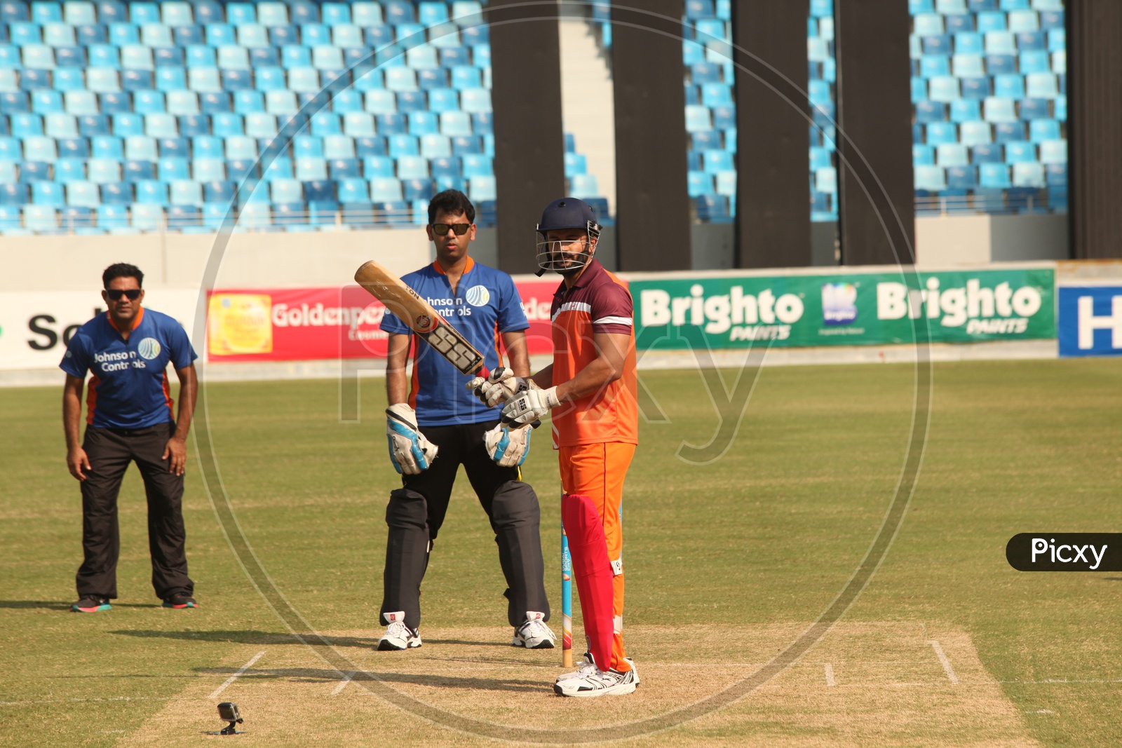Image of Cricketers Playing Cricket In a Stadium-IZ130858-Picxy