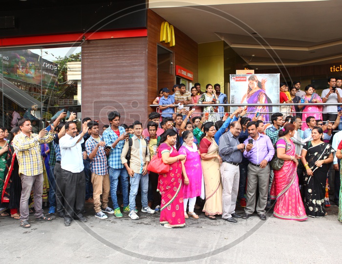 Image of Fans Waiting At a Movie Theater-HN355615-Picxy