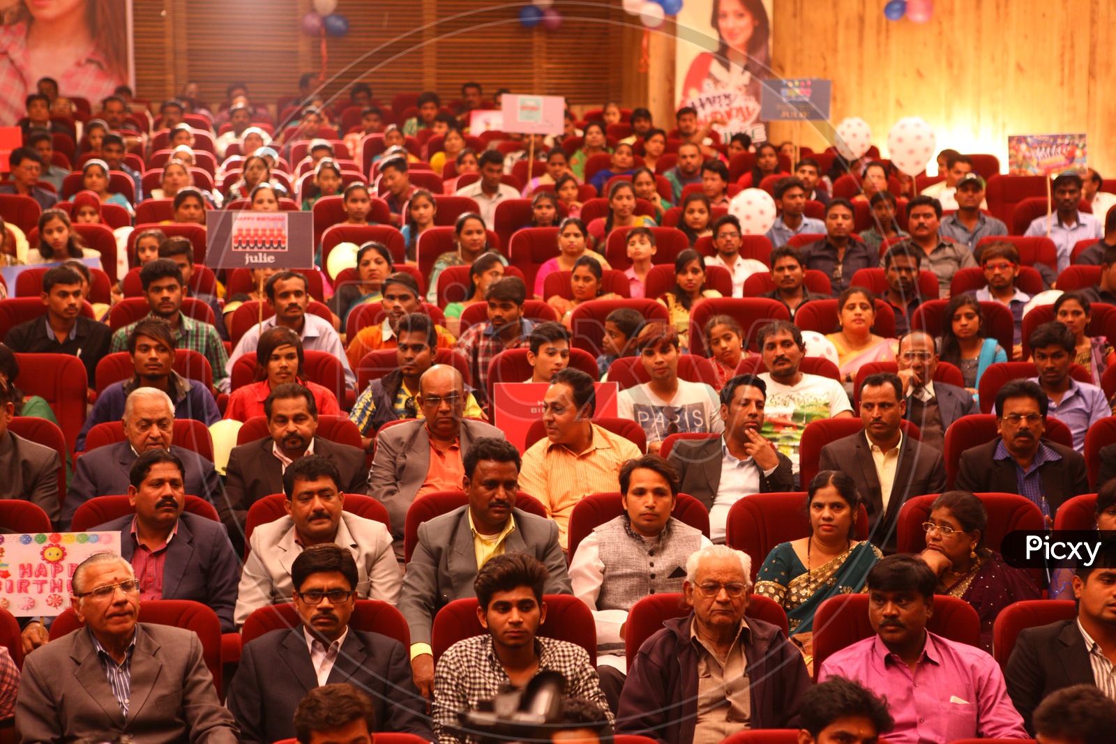 Image of Crowd Sitting In An Auditorium-AD583542-Picxy