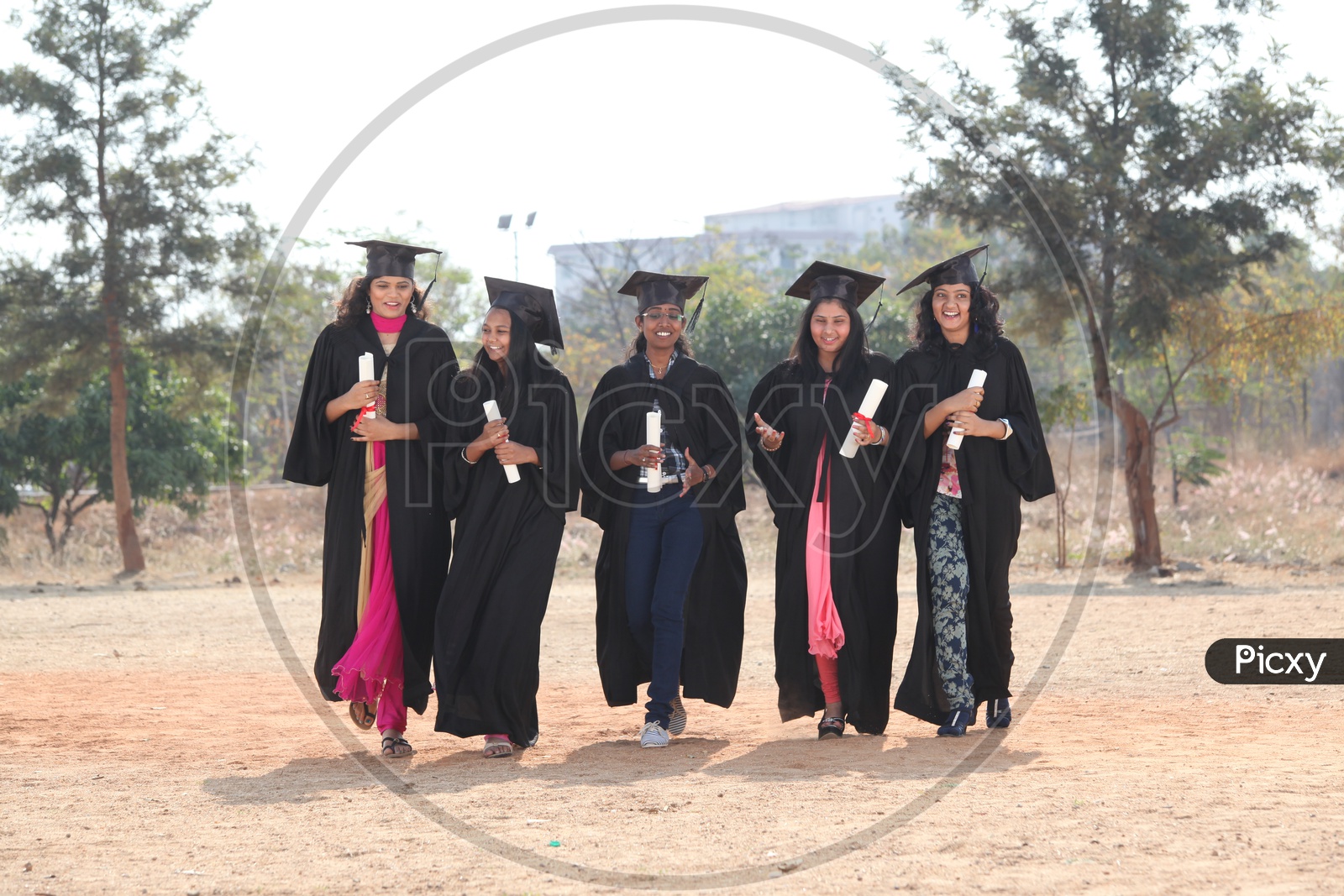 Image of Young Indian Students Wearing Graduation Day Dress-NU642208-Picxy