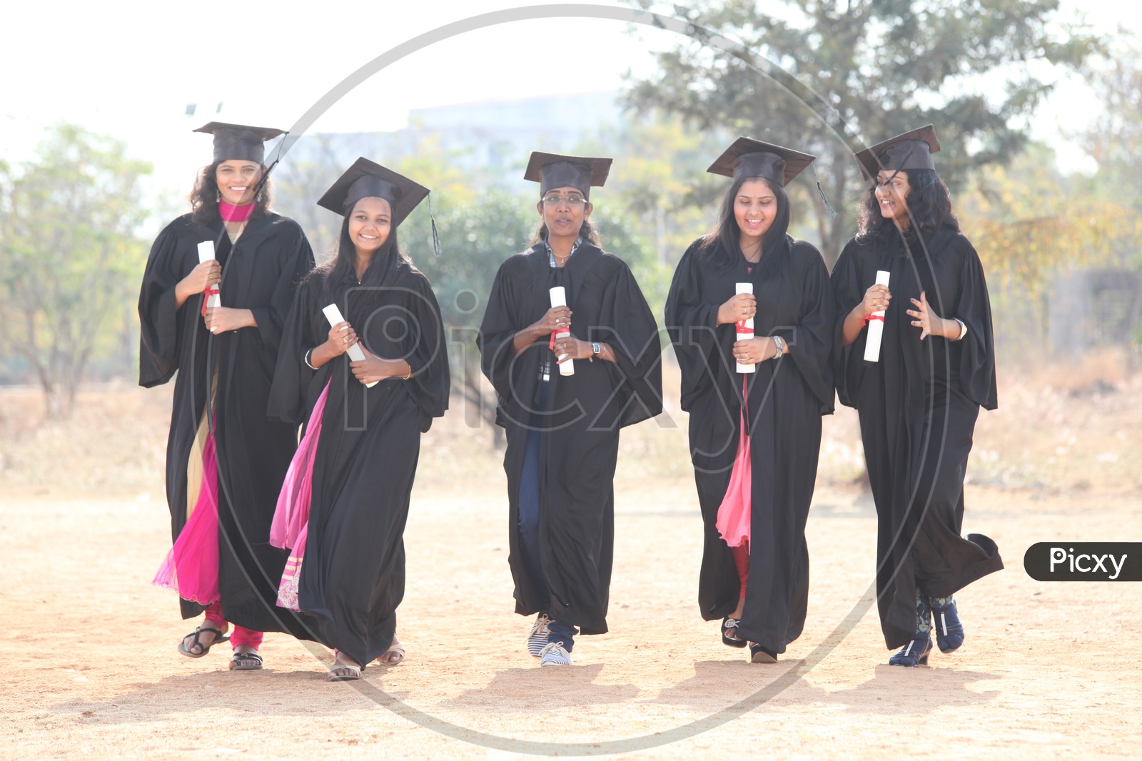 Image of Young Indian Students Wearing Graduation Day Dress-EI141904-Picxy